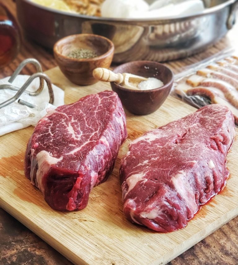 Beef Tenderloin Steaks with Bourbon Bacon Pecan Sauce - thefitfork.com